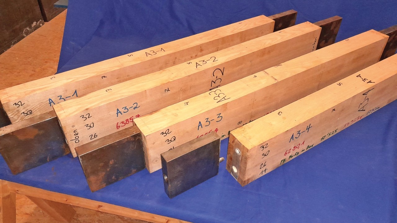 Fatigue behavior of glued-in threaded rods in wooden bridge construction